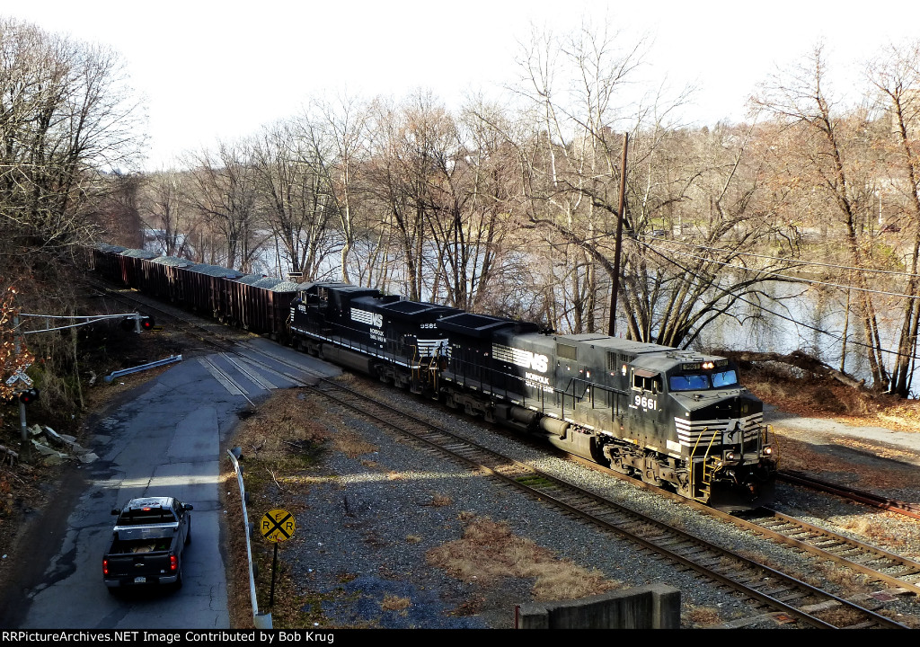 NS 9661 leads a unit ballast train eastbound